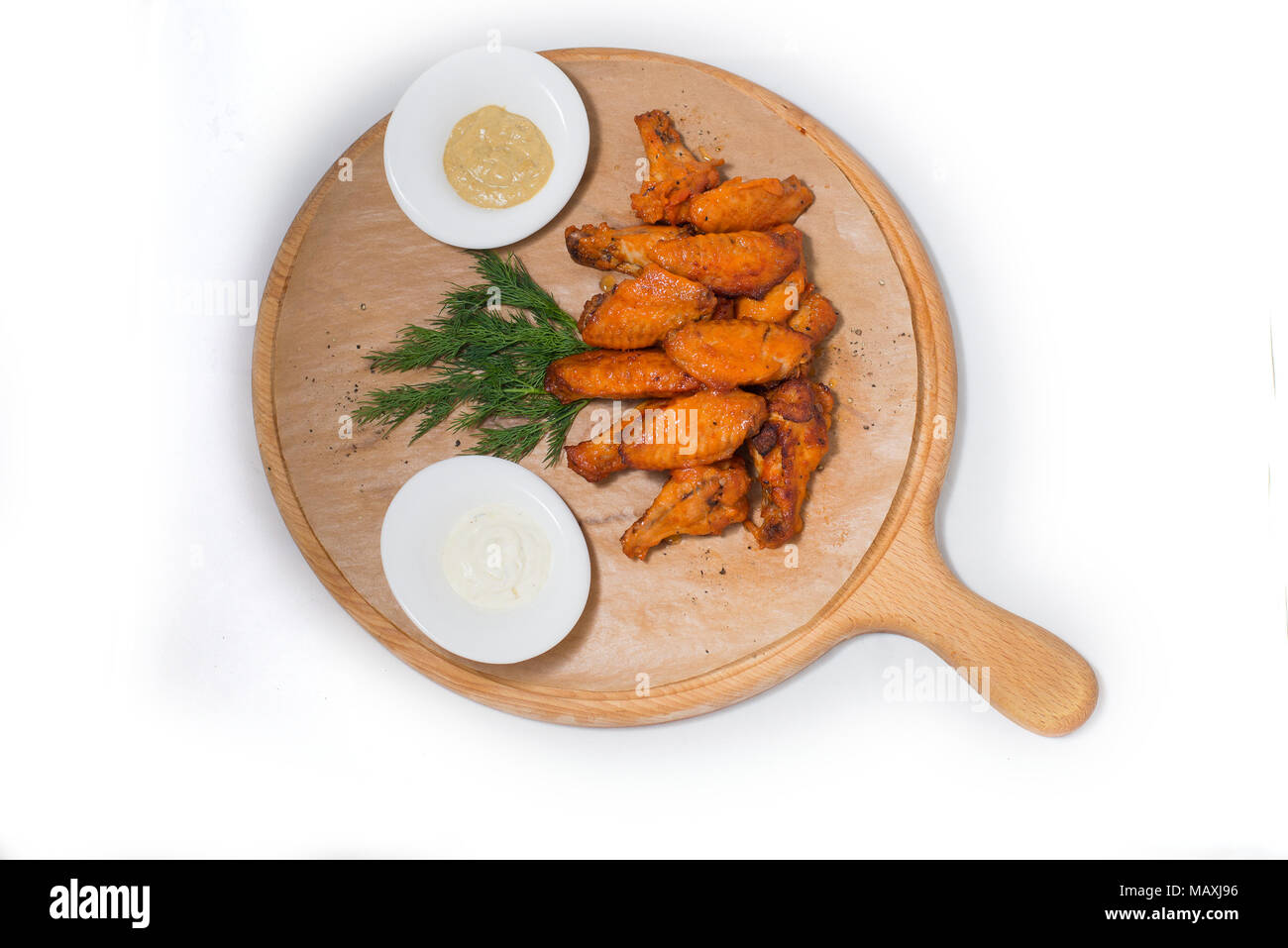 Grilled chicken wings on a tree white background Stock Photo - Alamy