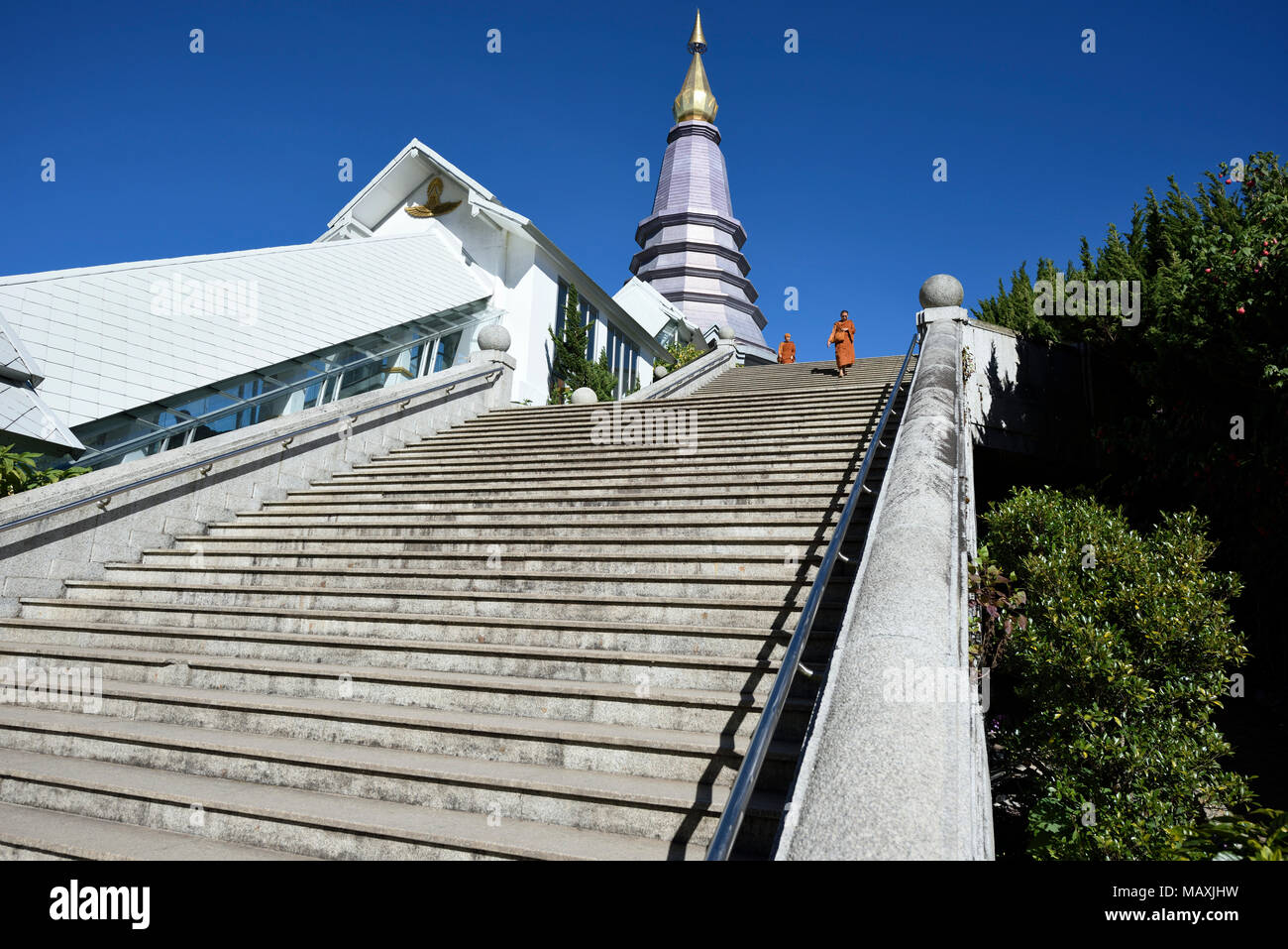 Buddhist monks at the stairs to queen pagoda Chedi, Doi Inthanon ...
