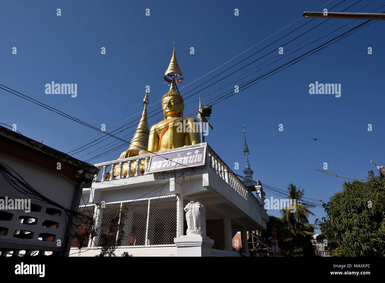 golden Buddha statue at temple Wat Chiang Yuen, Chiang Mai, Thailand ...