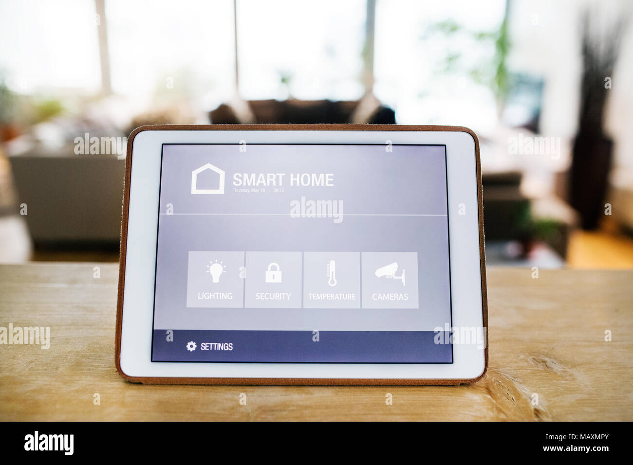 A tablet with smart home screen Stock Photo - Alamy