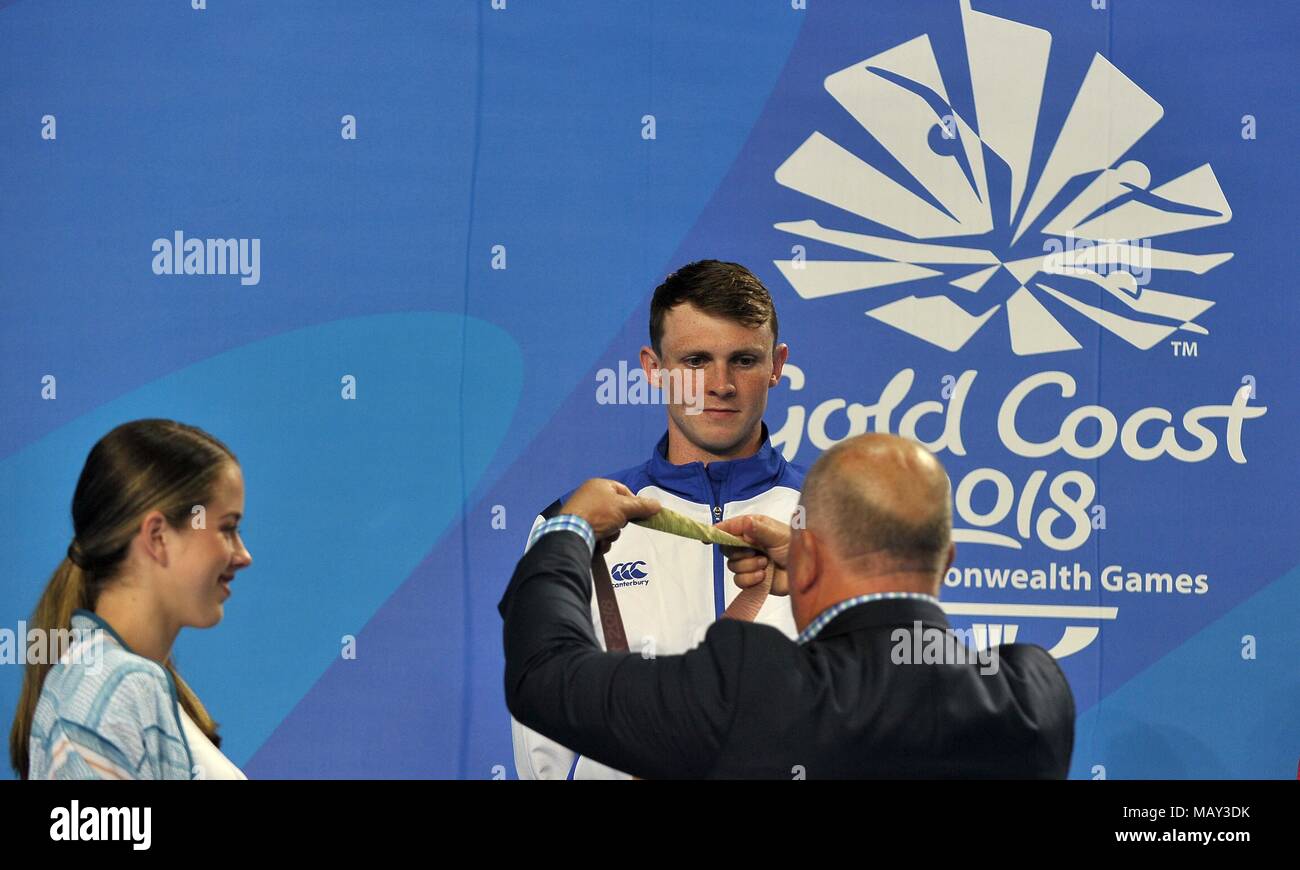 2018 swimming finals xxi commonwealth hi-res stock photography and ...