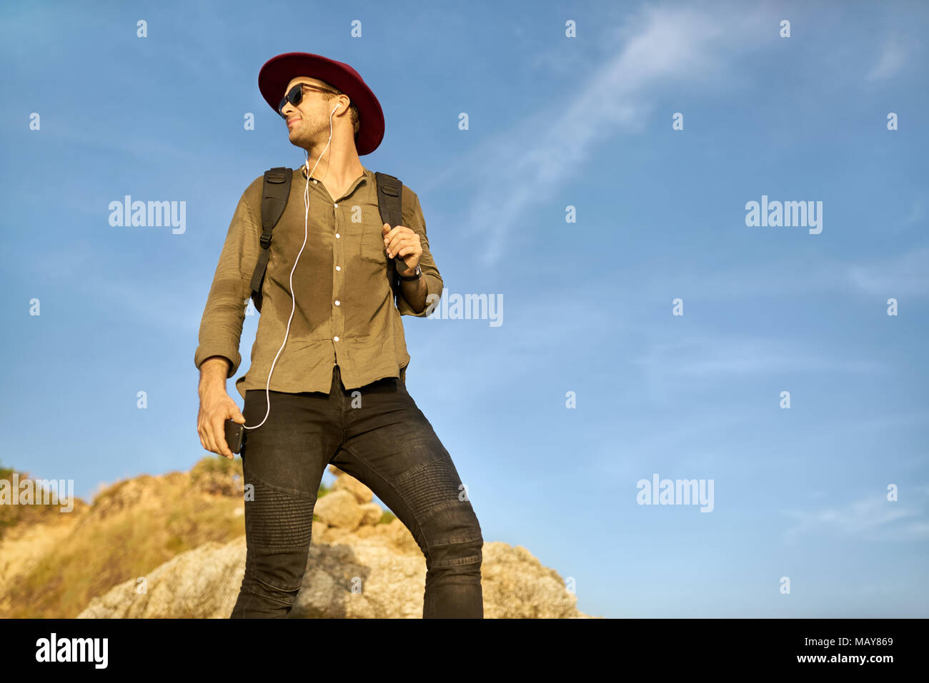 Traveler posing outdoors Stock Photo - Alamy