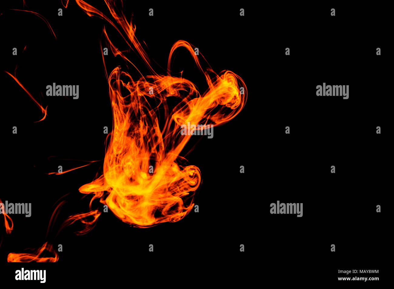 Fire flames background. Cloud of fiery smoke on a black isolated ...