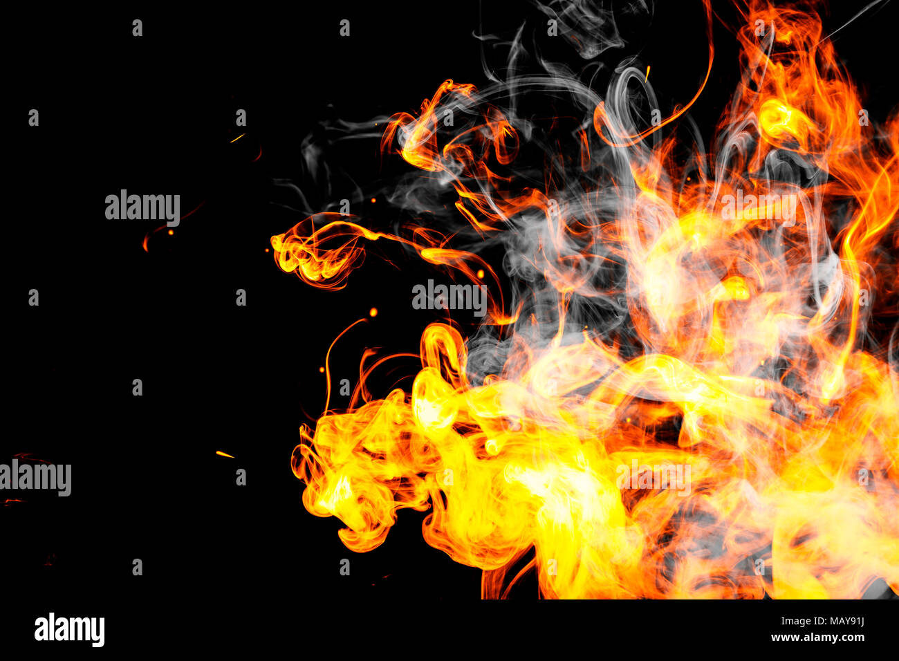 Fire flames background. Dense fiery smoke on a black isolated ...