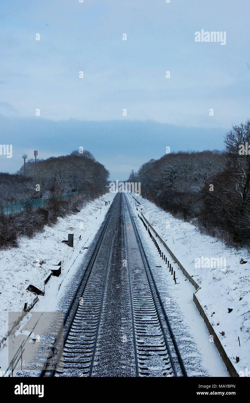 Snow Covered Train Tracks Stock Photo - Alamy