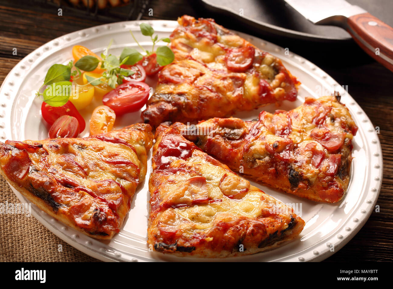 Homemade pizza on a white plate Stock Photo - Alamy