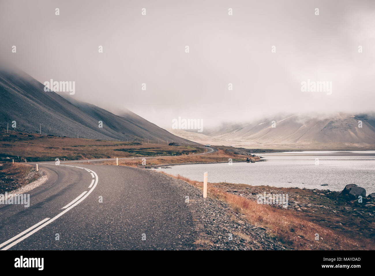 Highway through Iceland landscape at overcast day. Horizontal shot ...