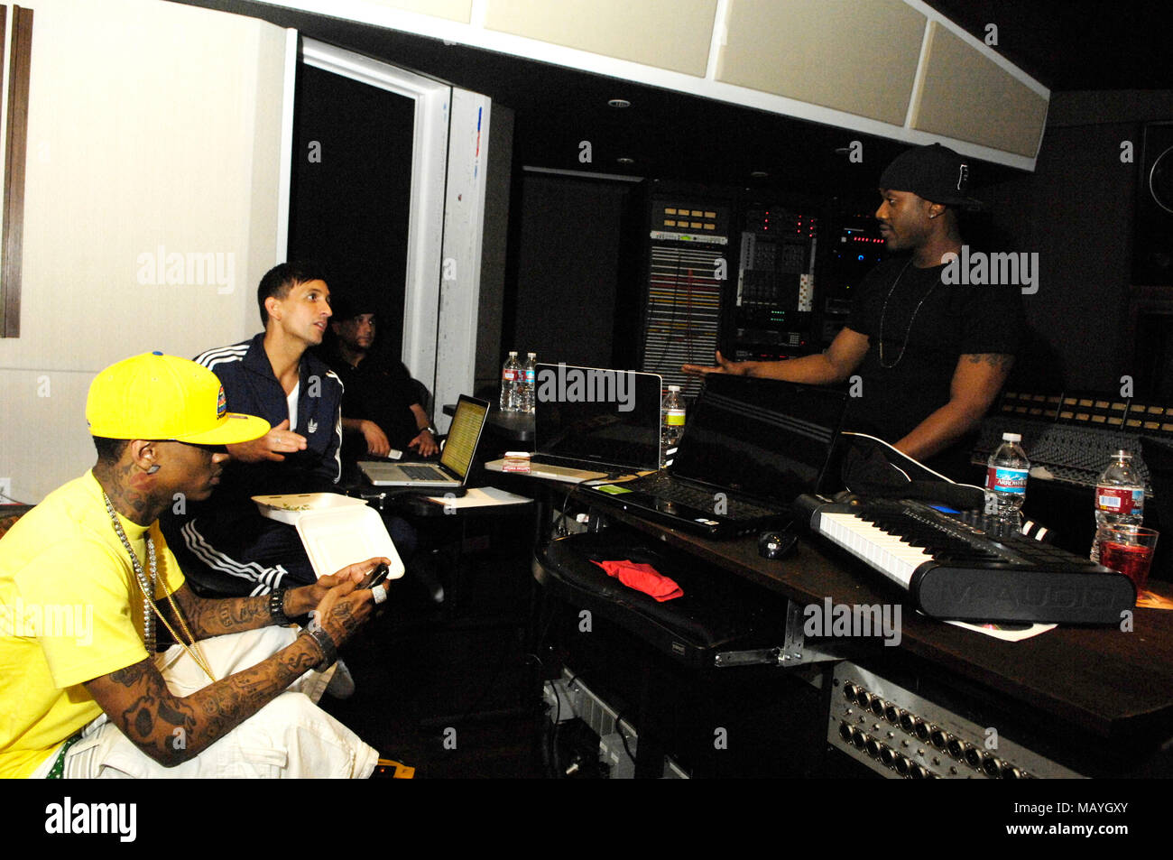Deandre Way aka Soulja Boy, Clinton Sparks and Ray J at a recording ...