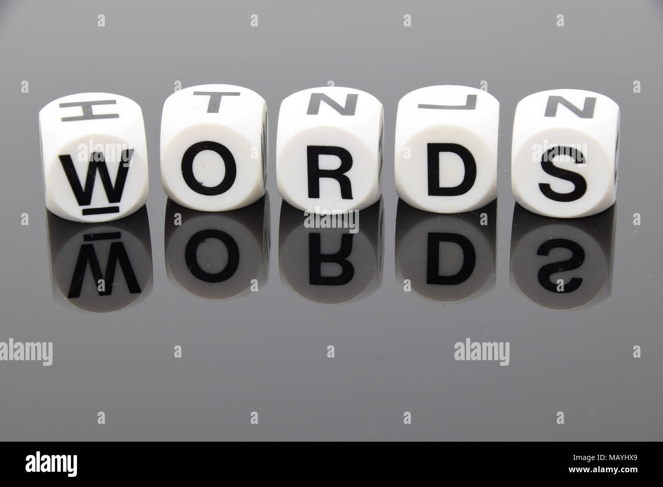 The word Words spelt out in letter dice Stock Photo - Alamy
