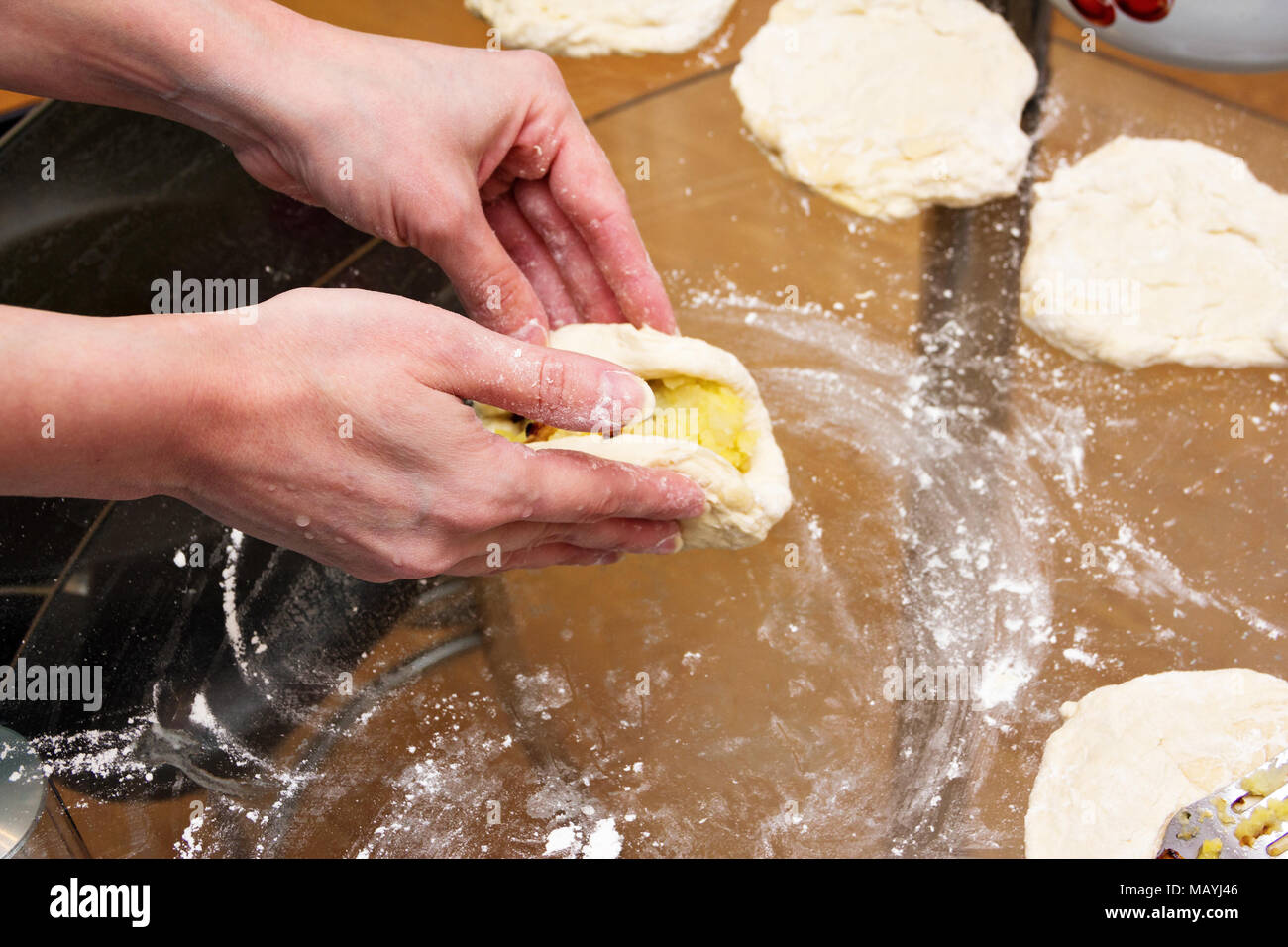 Mashed potatoes hand hi-res stock photography and images - Alamy