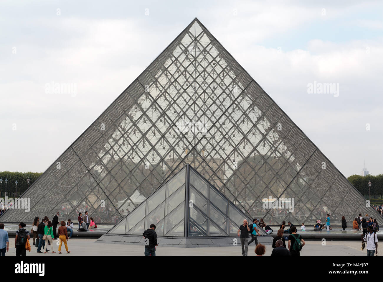 The Glass Pyramid in Louvre Paris, France. It serves as the main ...