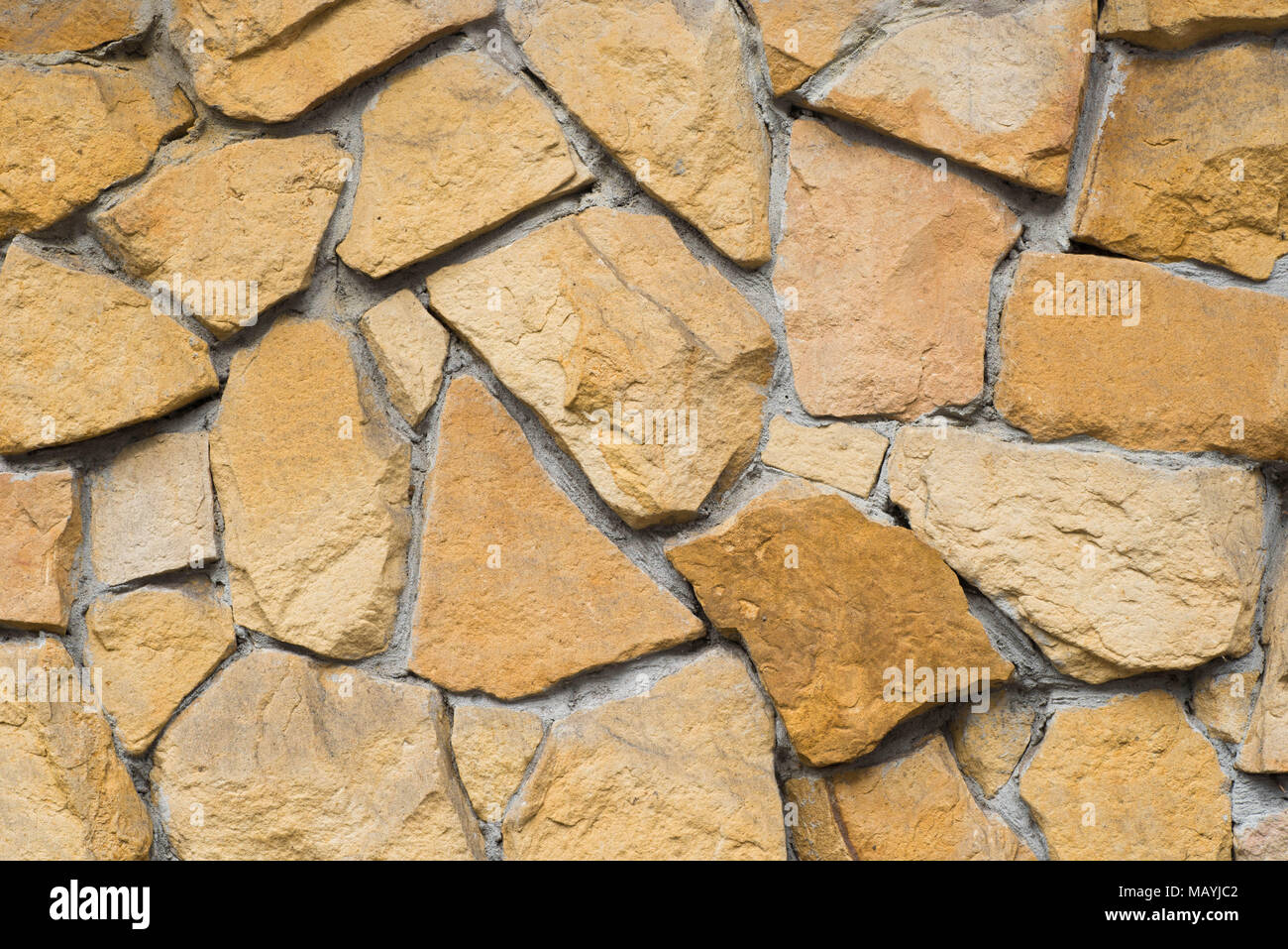 sandstone beige stone wall background texture Stock Photo - Alamy