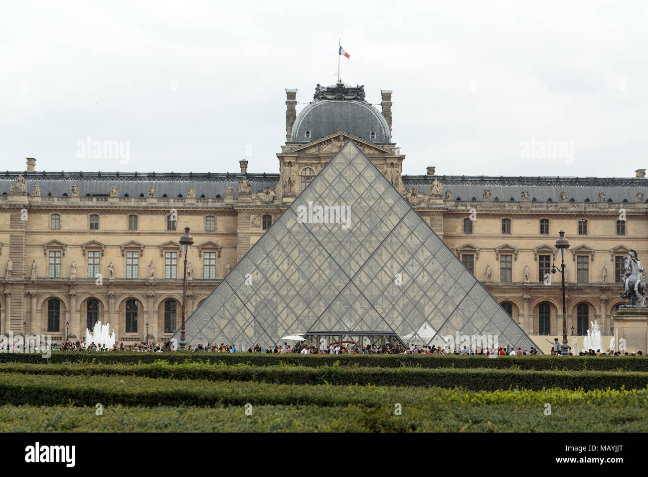 The Glass Pyramid in Louvre Paris, France. It serves as the main ...