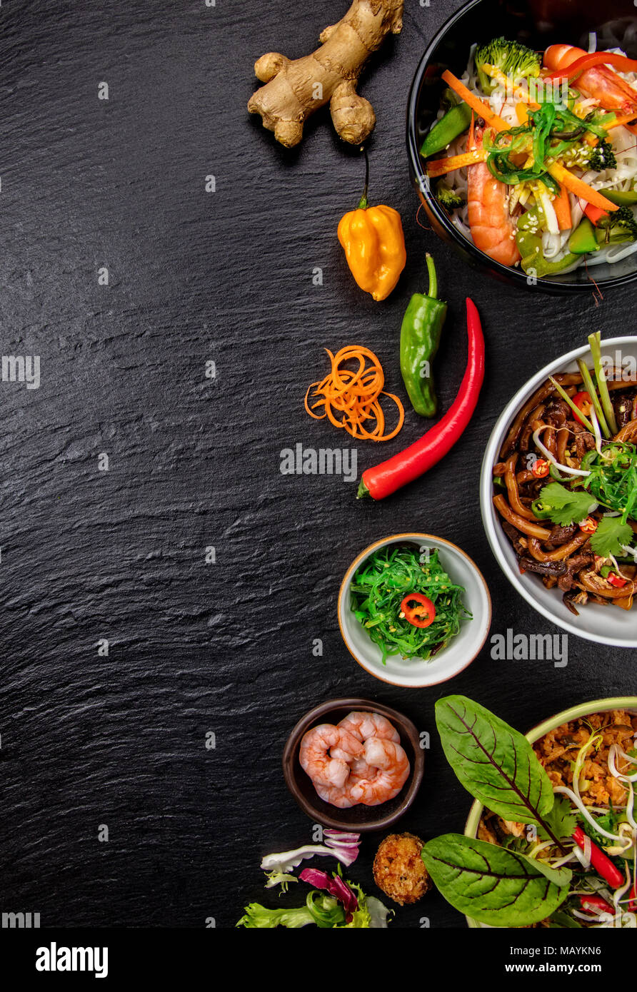 Asian food variation with many kinds of meals. Kari rice, noodles and ...