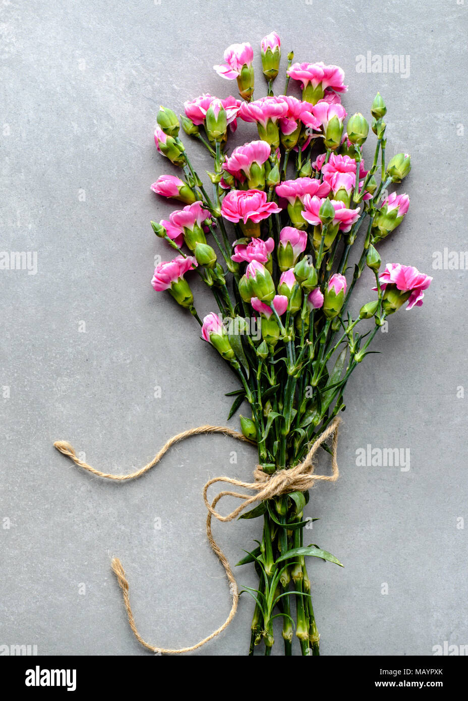 Fresh spring flowers bouquet on grey background, flat lay, overhead ...