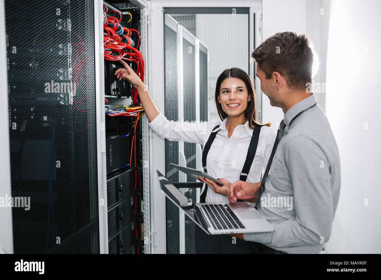 IT expert checking supercomputer server Stock Photo - Alamy