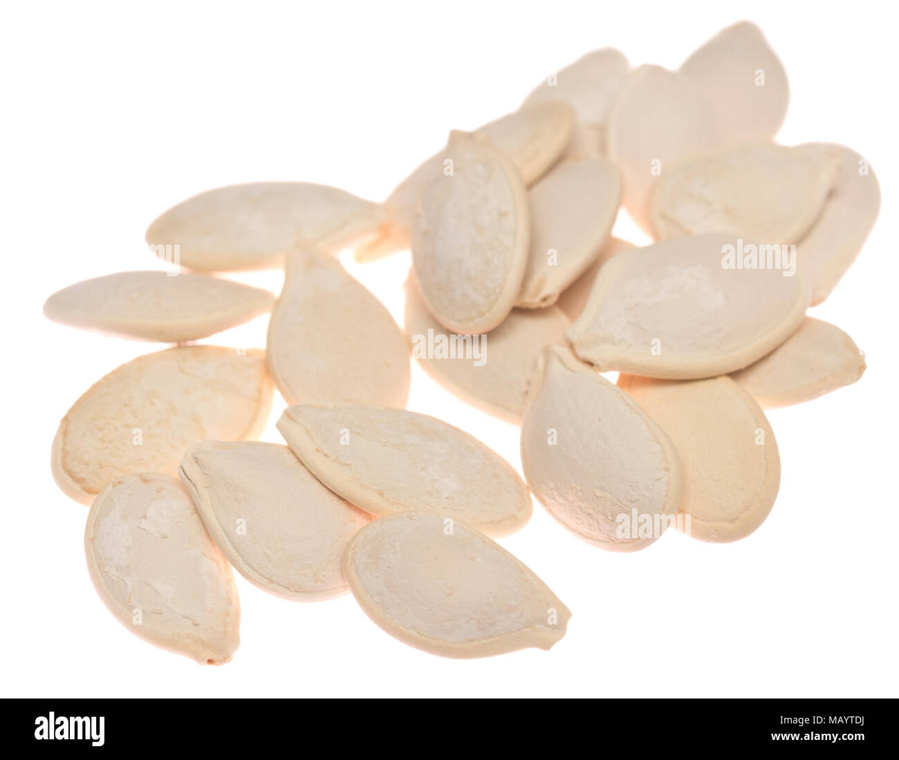 Pumpkin seeds isolated on white background Stock Photo - Alamy