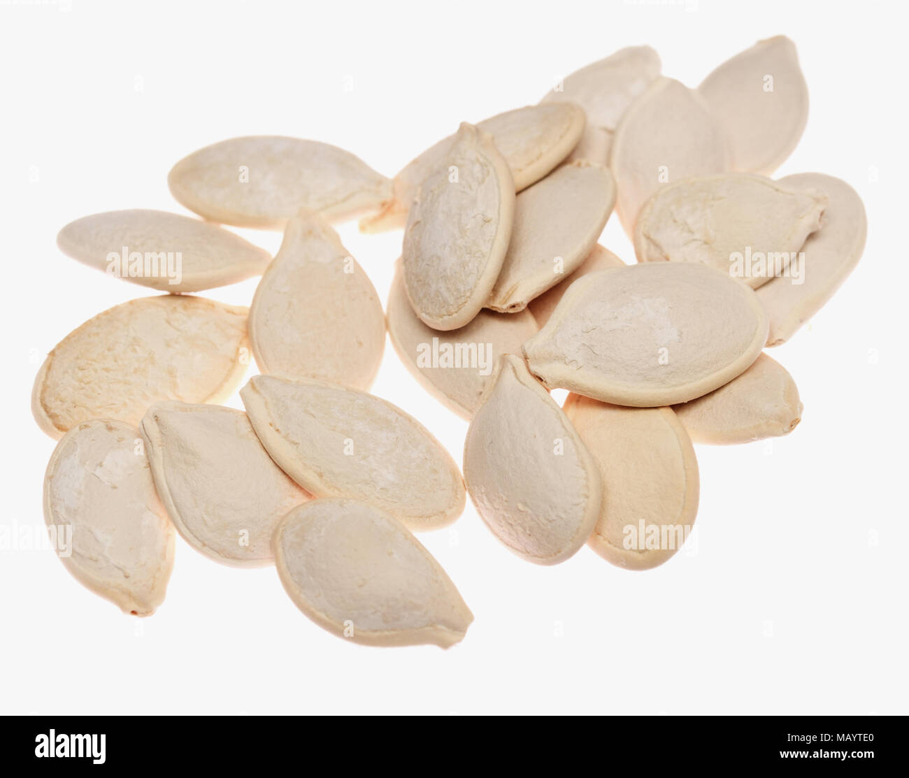 Pumpkin seeds isolated on white background Stock Photo - Alamy