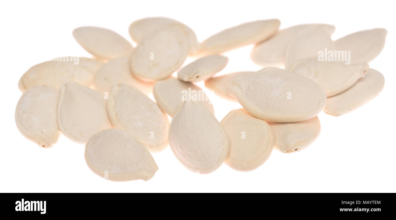 Pumpkin seeds isolated on white background Stock Photo - Alamy
