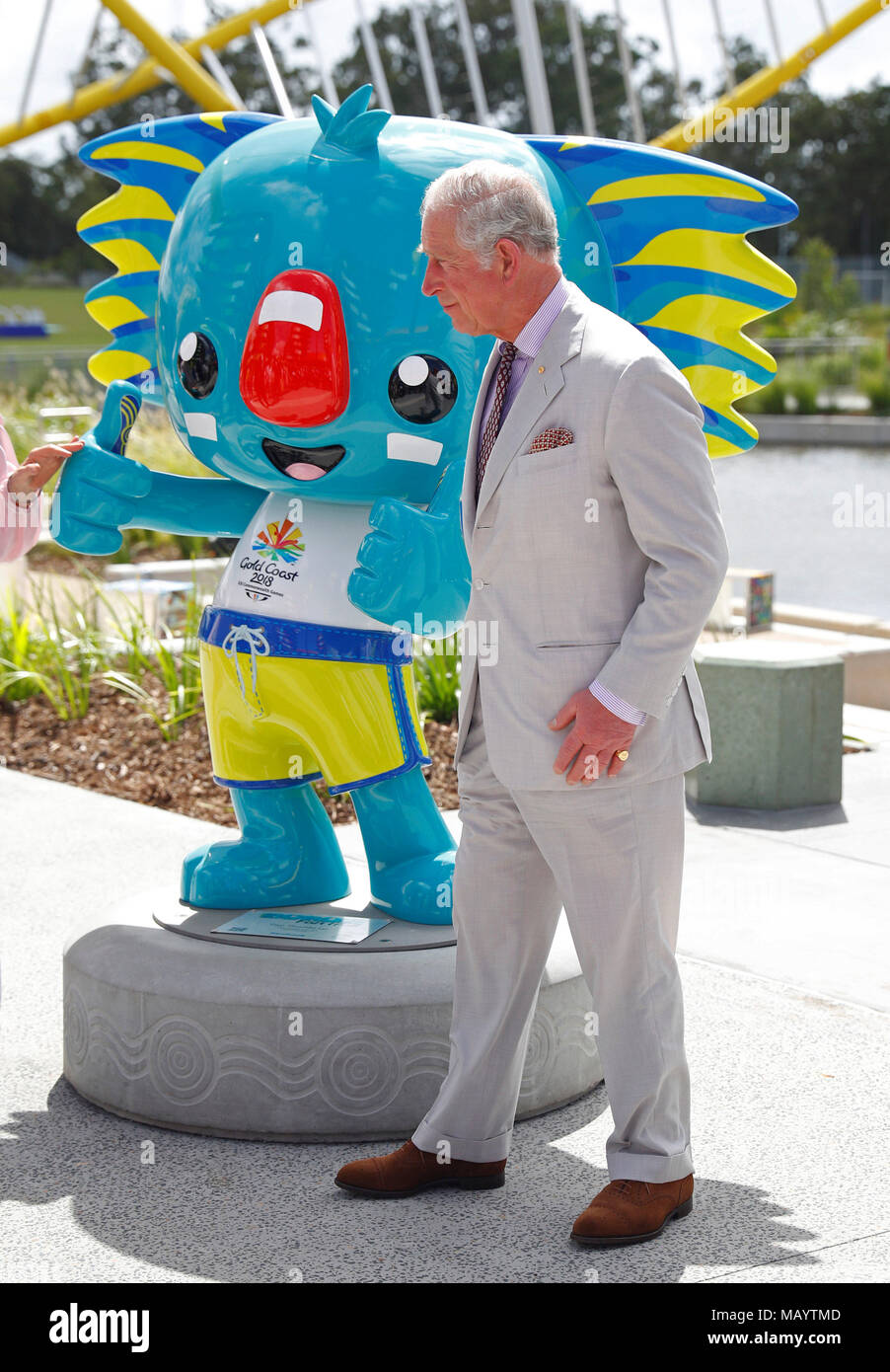 The Prince of Wales with the games mascot Borobi during a visit the ...