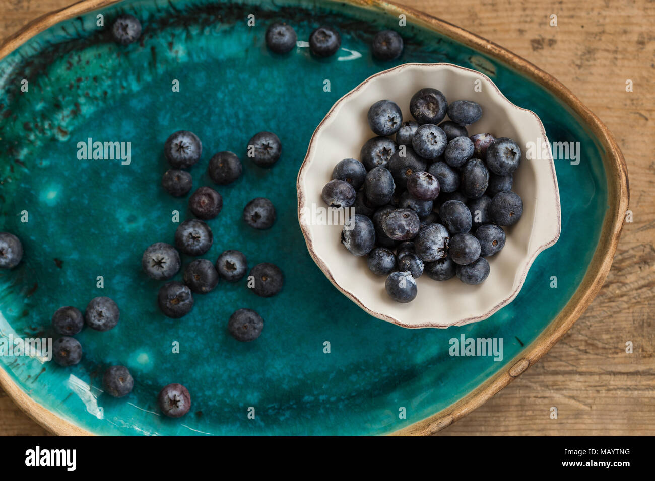 Healthy eating concept. Blueberries in small white ceramice plate ...
