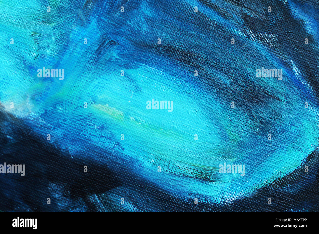 Texture of a canvas with large brushstokes of blue oil paint close-up ...