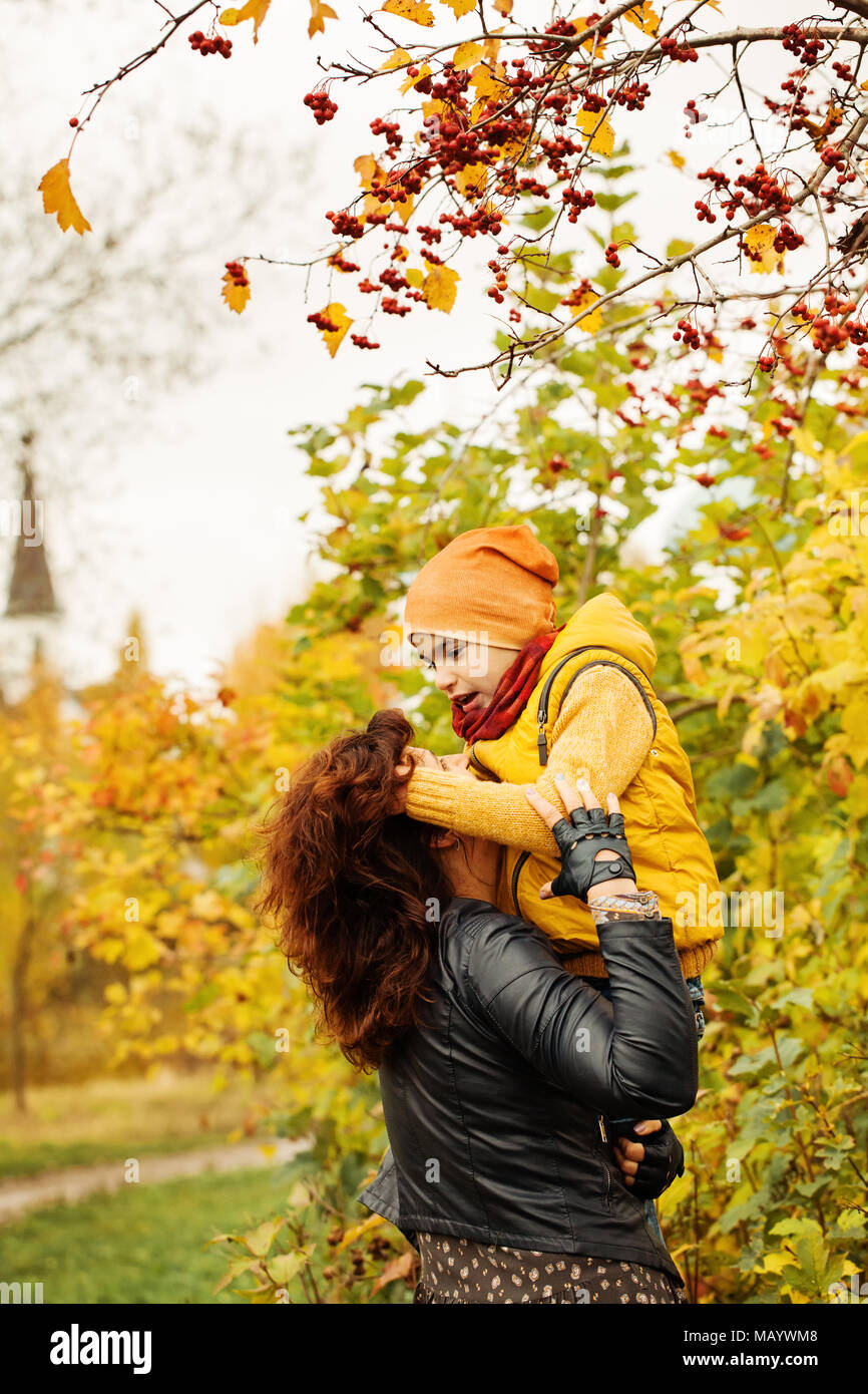 Autumn Family. Loving Mother and Son in Fall Park Outdoors Stock Photo ...