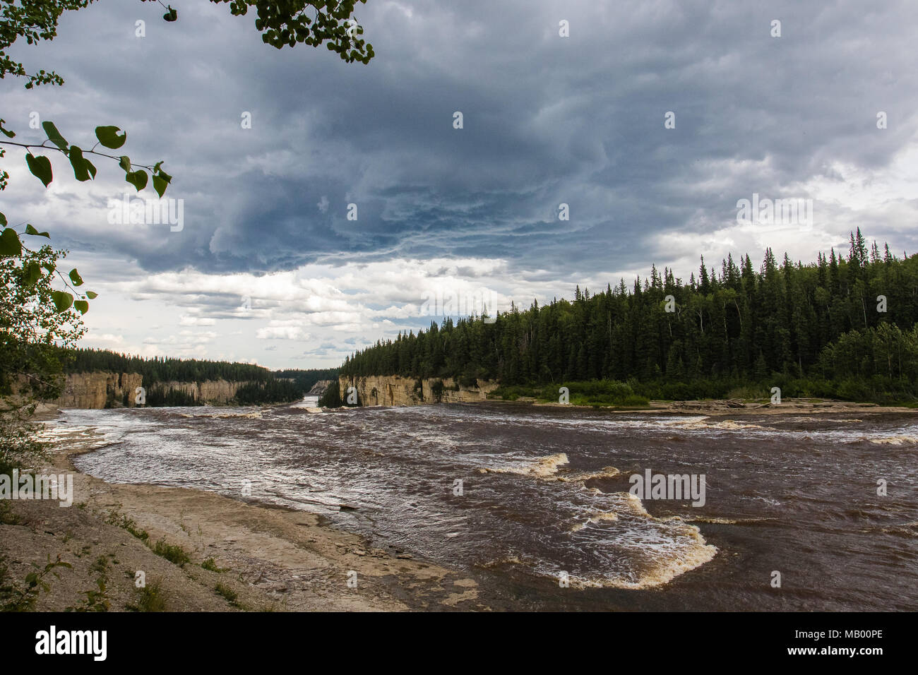 Alexandra Falls tumble 32 meters over the Hay River, Twin Falls Gorge ...