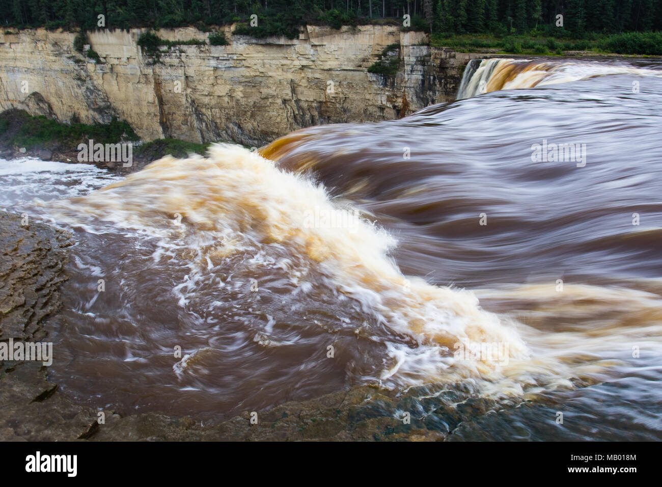 Alexandra Falls tumble 32 meters over the Hay River, Twin Falls Gorge ...