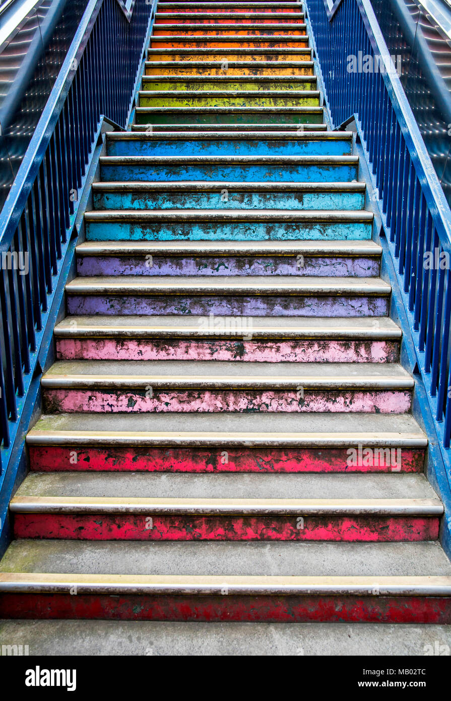 An old multi coloured stair case Stock Photo - Alamy