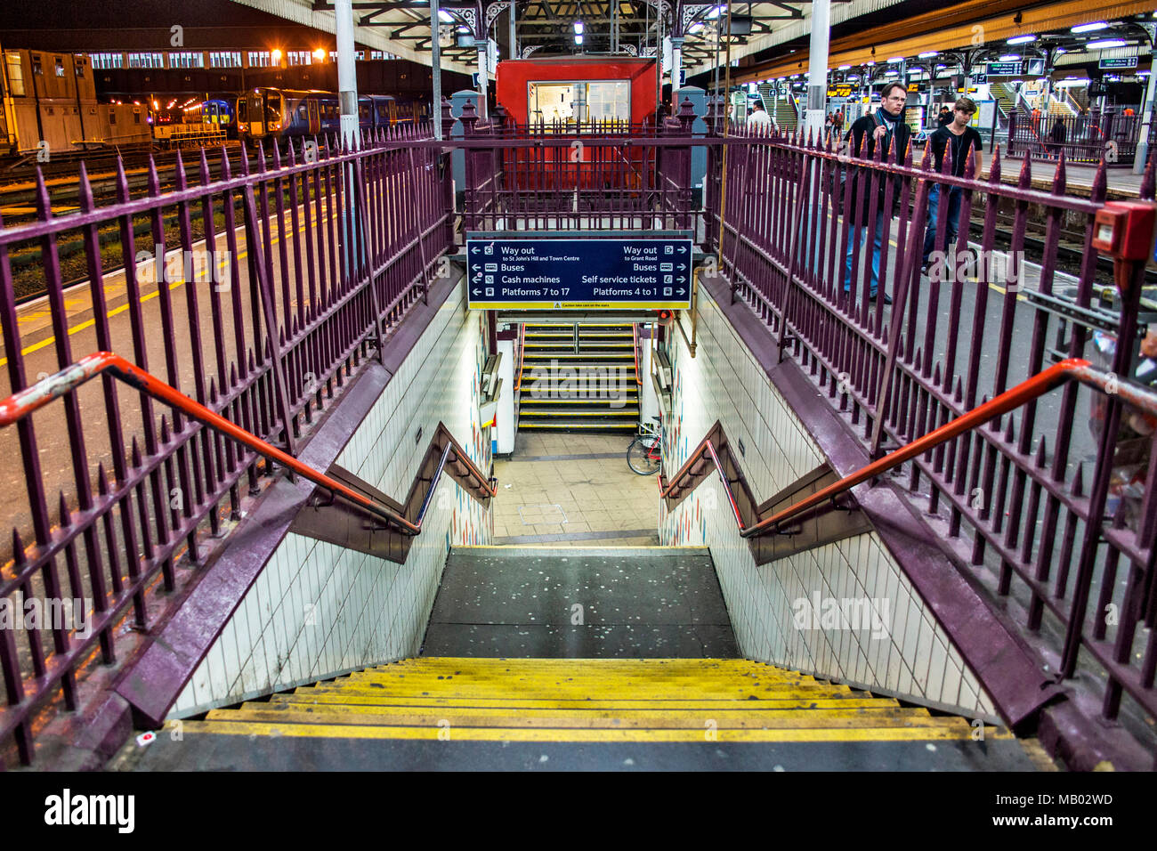 Looking down a set of stairs to the underground Stock Photo - Alamy