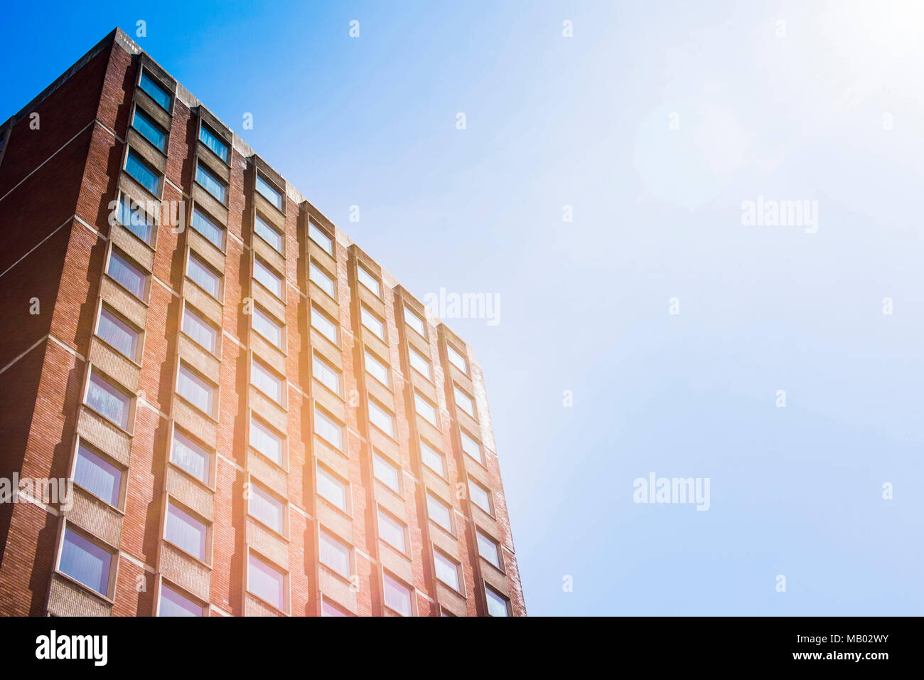 A view up toward a high rise building Stock Photo - Alamy