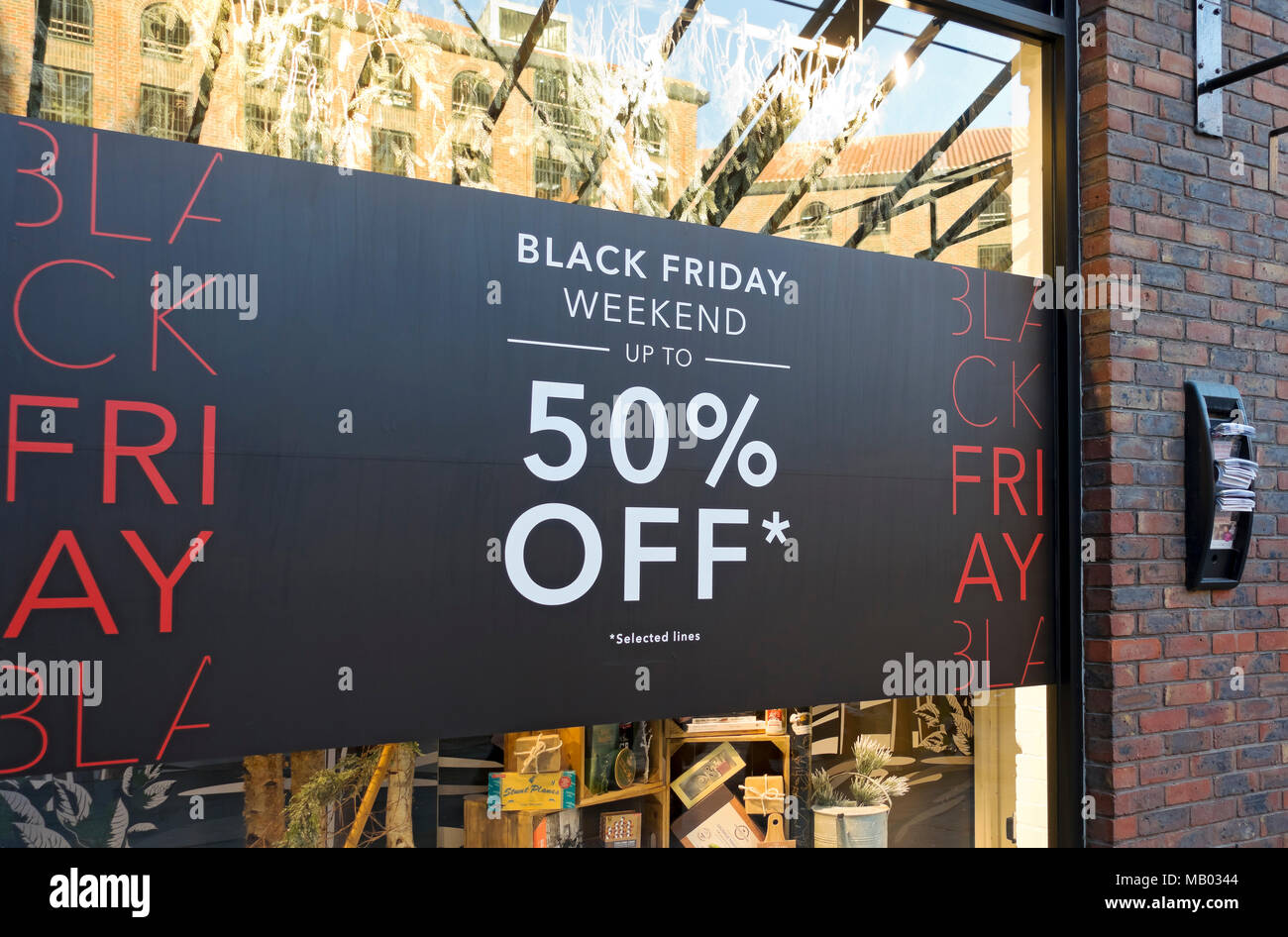 Black Friday signs on shop window Stock Photo - Alamy