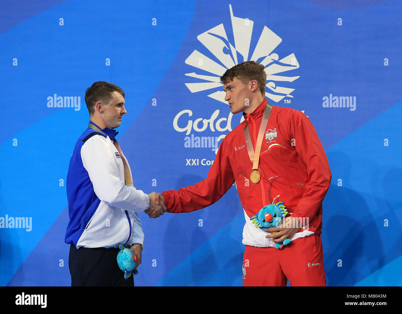 England's James Wilby with his Gold medal in the Men's 200m ...
