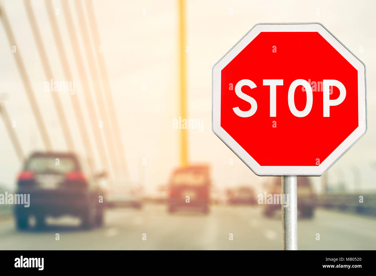 Stop sign by the City road Stock Photo - Alamy