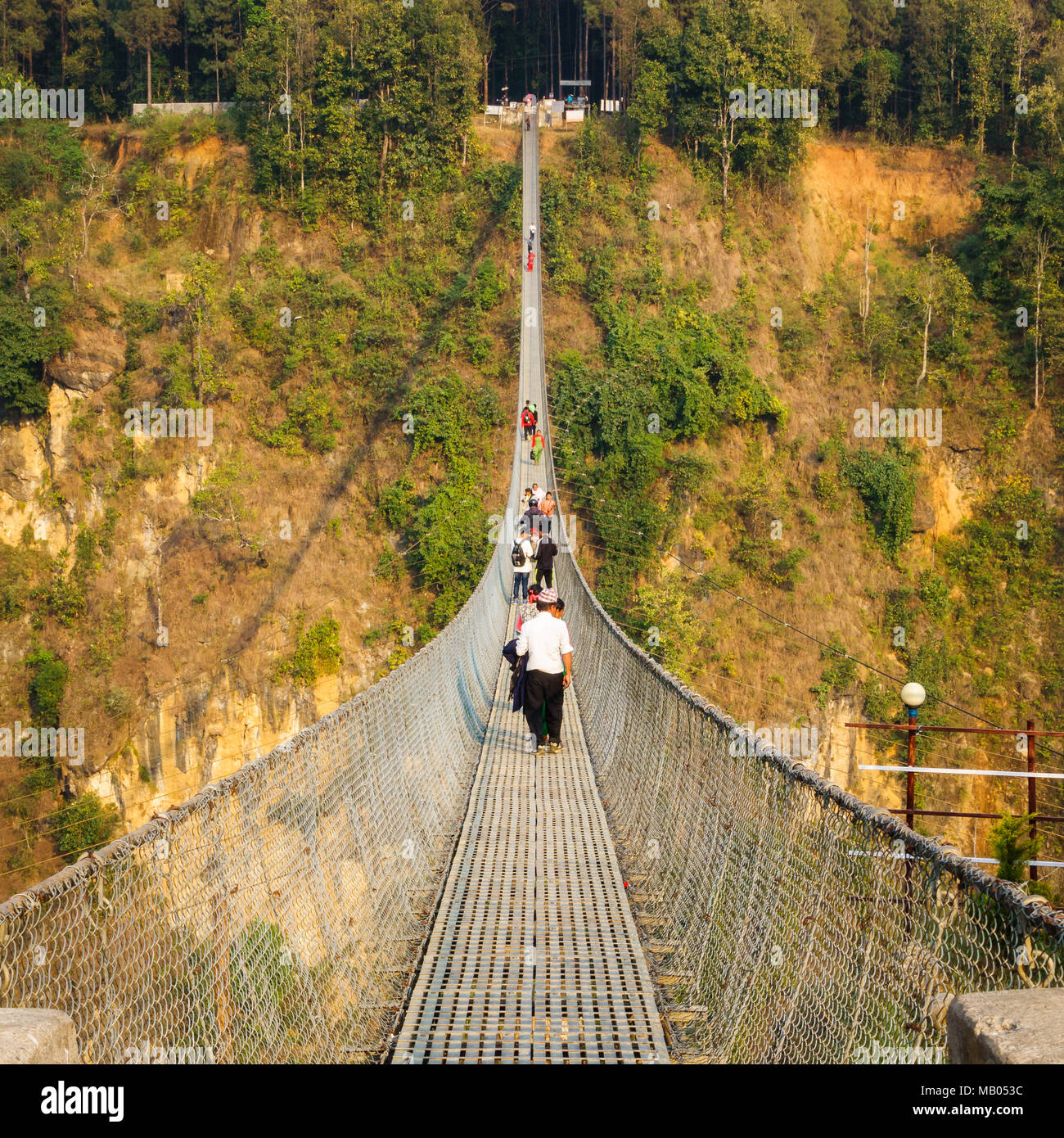 KUSHMA, NEPAL - CIRCA MARCH 2018: People crossing the Kali Gandaki ...