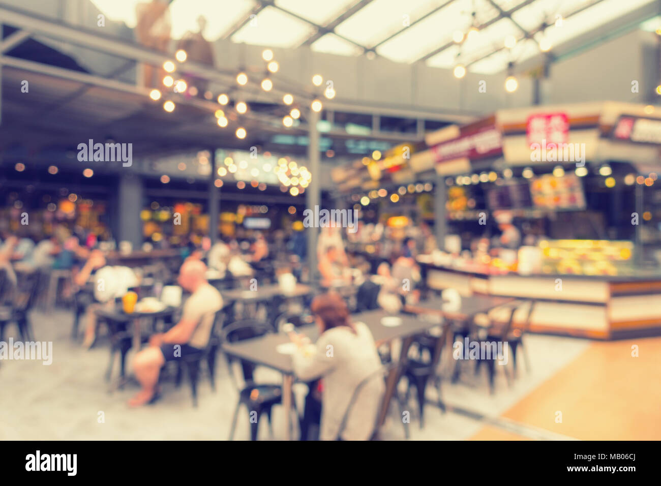 Food court and blur background Stock Photo - Alamy