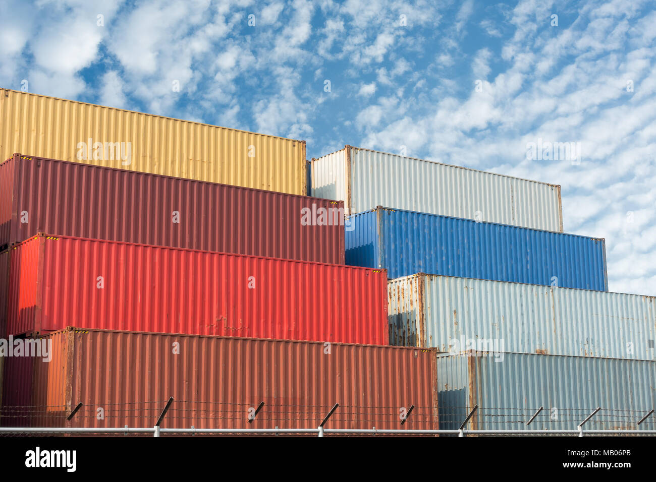 Handling stack of container shipping with sunshine., Transportation ...