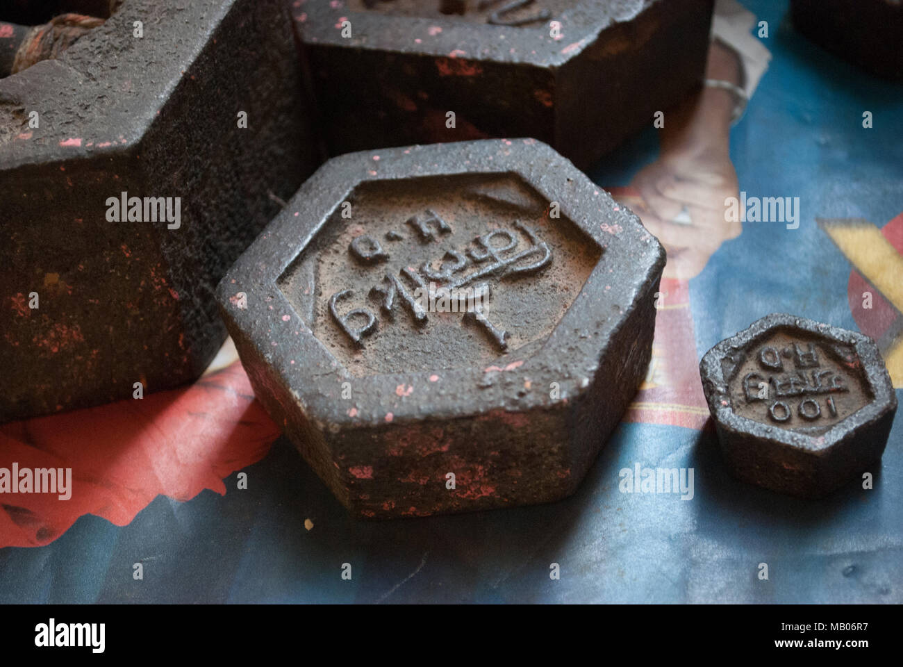 weighing iron weight Stock Photo - Alamy