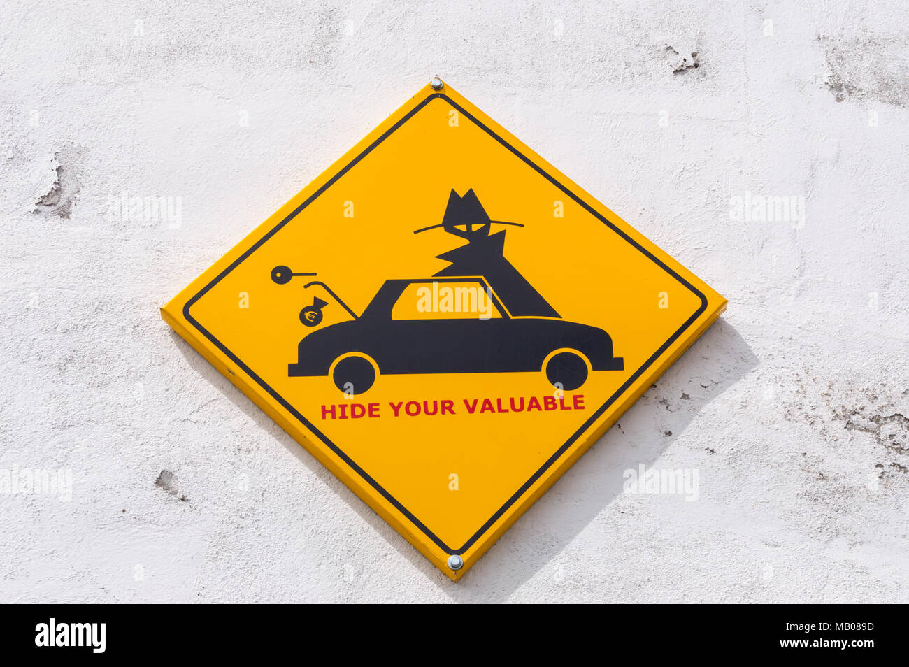 Yellow sign asking to hide his precious belongings in the car to avoid ...