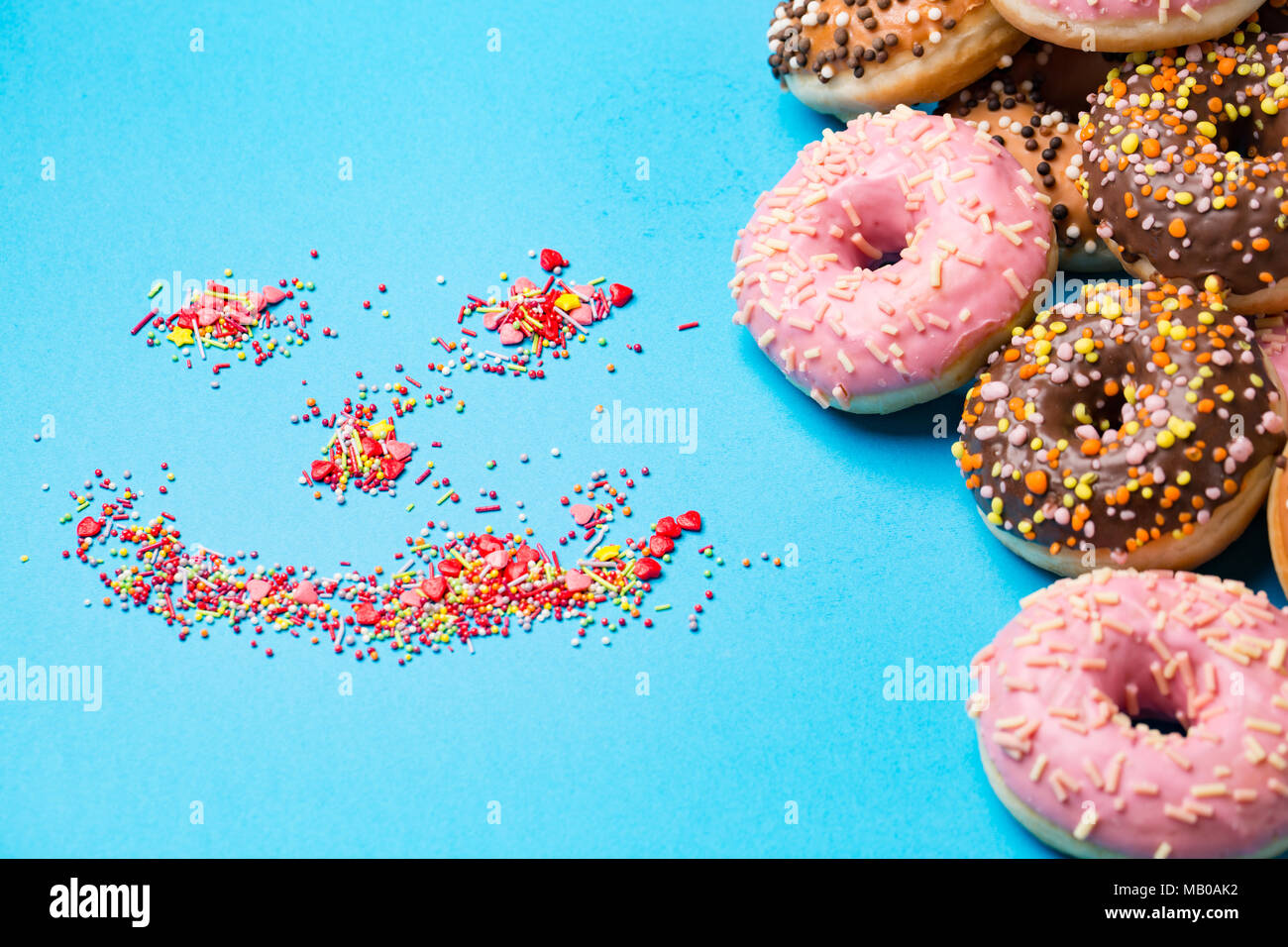 Donut smiley face hi-res stock photography and images - Alamy