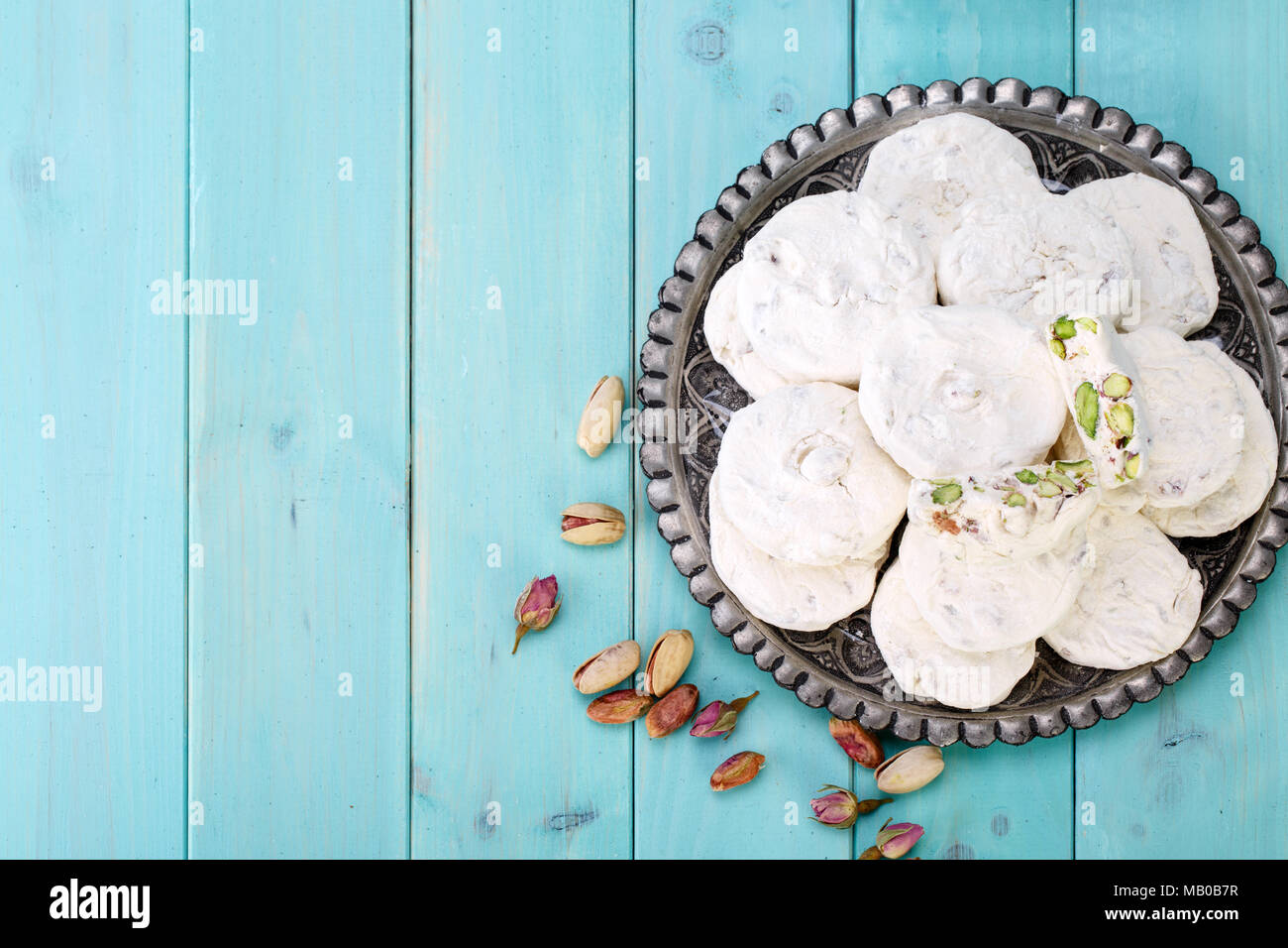 Shot from top Traditional Iranian and Persian pieces of white nougat ...