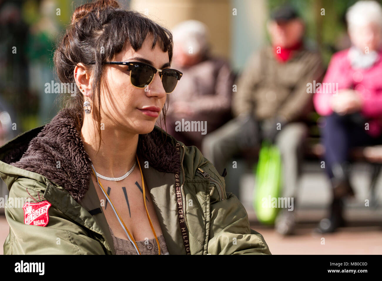 Woman sitting outside in dundee hi-res stock photography and images - Alamy