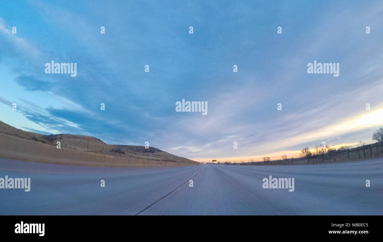 Driving on Interstate Highway I25 early in the morning Stock Photo - Alamy