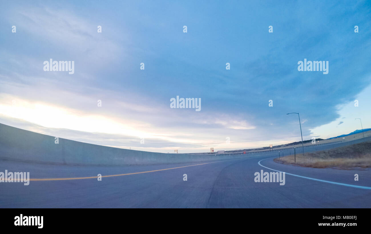 Driving on suburban road early in the morning Stock Photo - Alamy