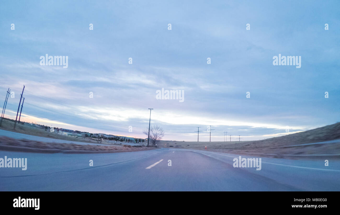 Driving on suburban road early in the morning Stock Photo - Alamy