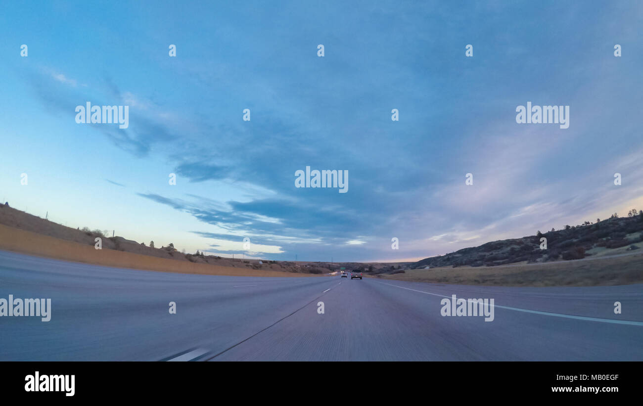 Driving on Interstate Highway I25 early in the morning Stock Photo - Alamy