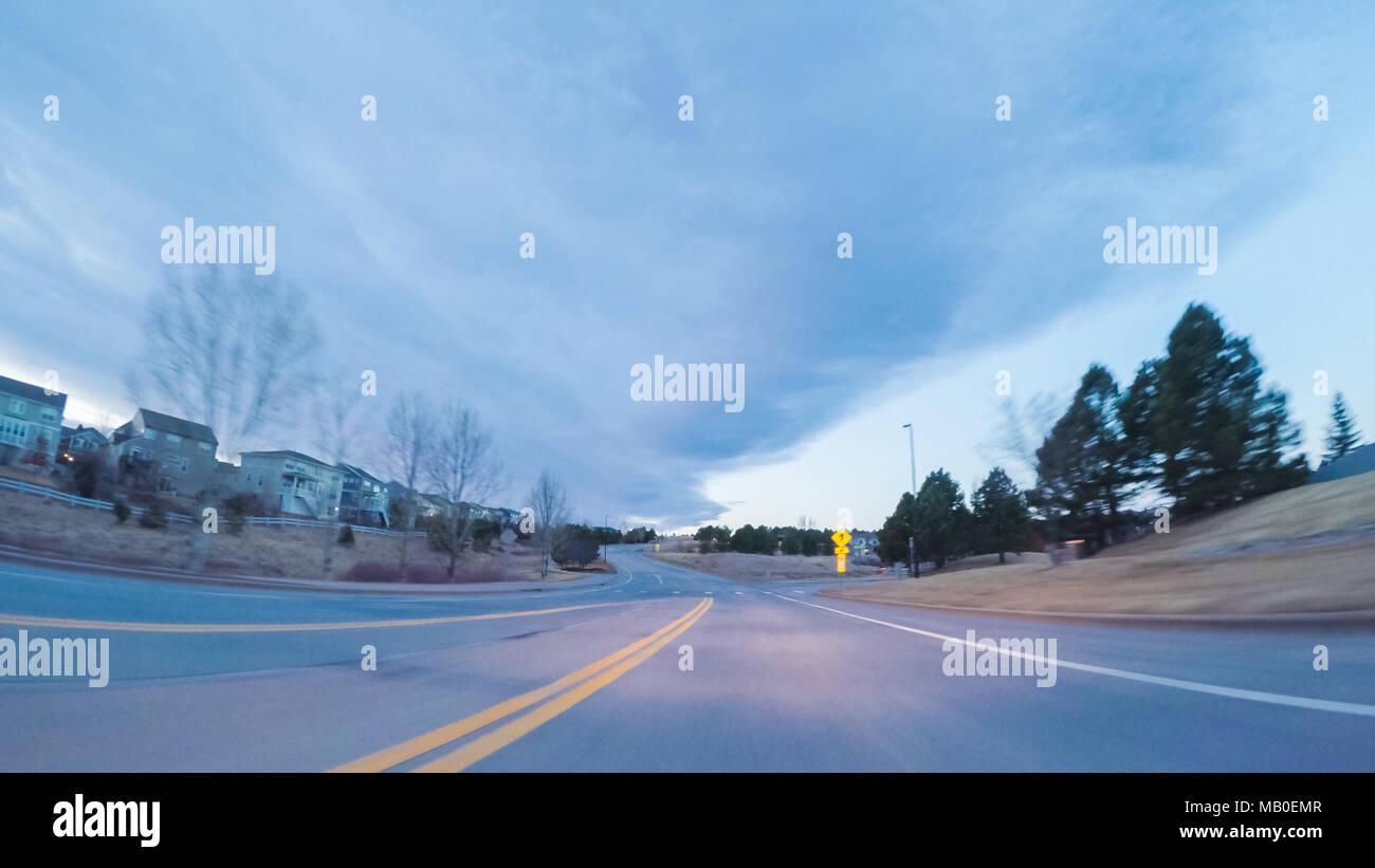 Driving on suburban road early in the morning Stock Photo - Alamy