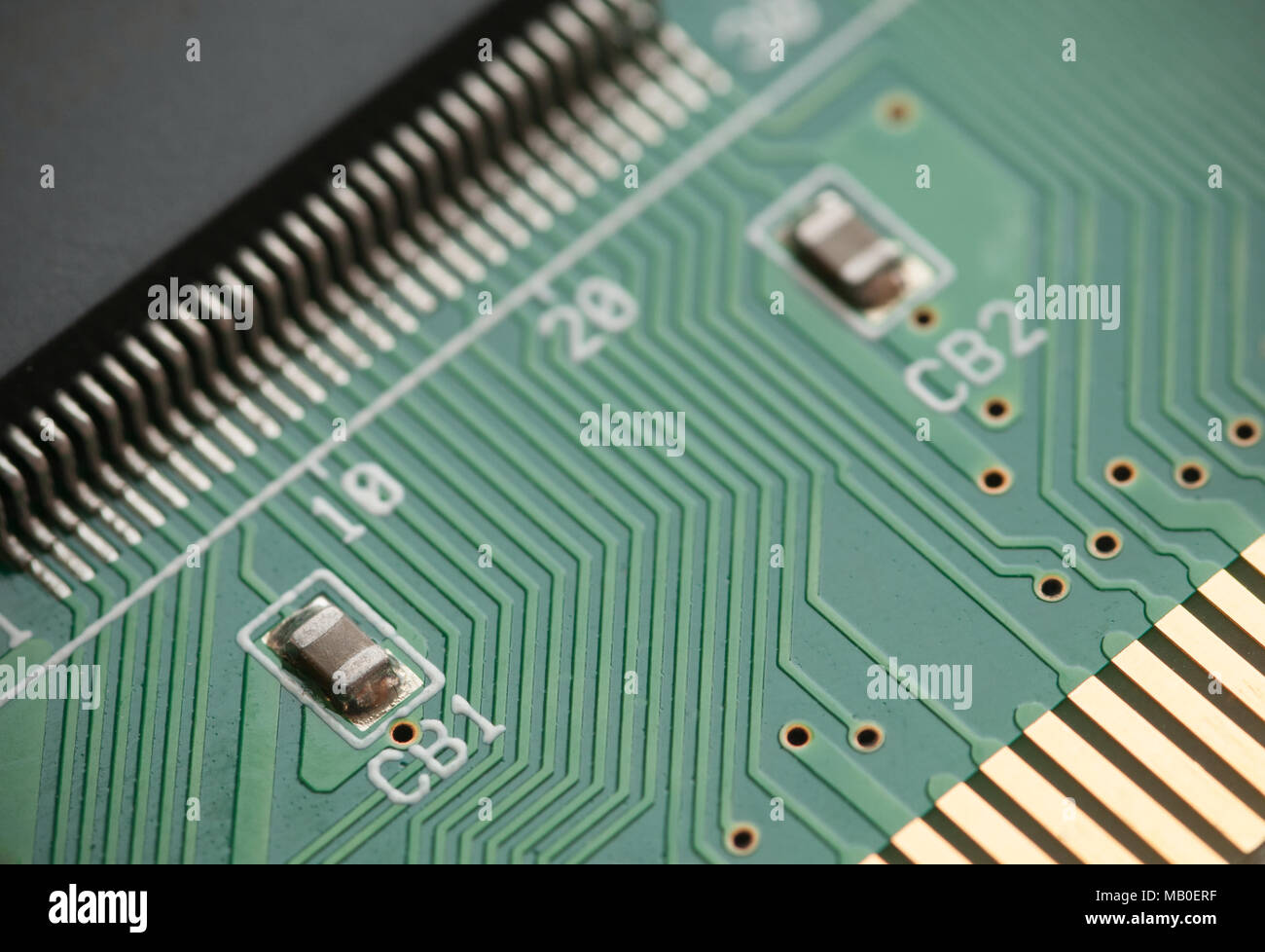 Details of a digital electronic circuit board with electric tracks and ...