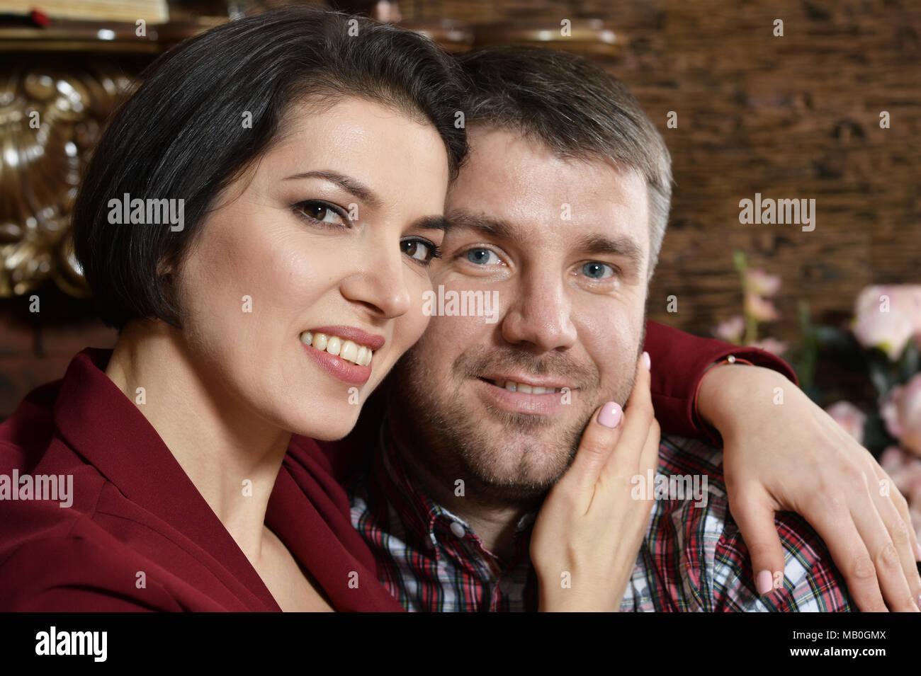 Beautiful young couple hugging hi-res stock photography and images - Alamy